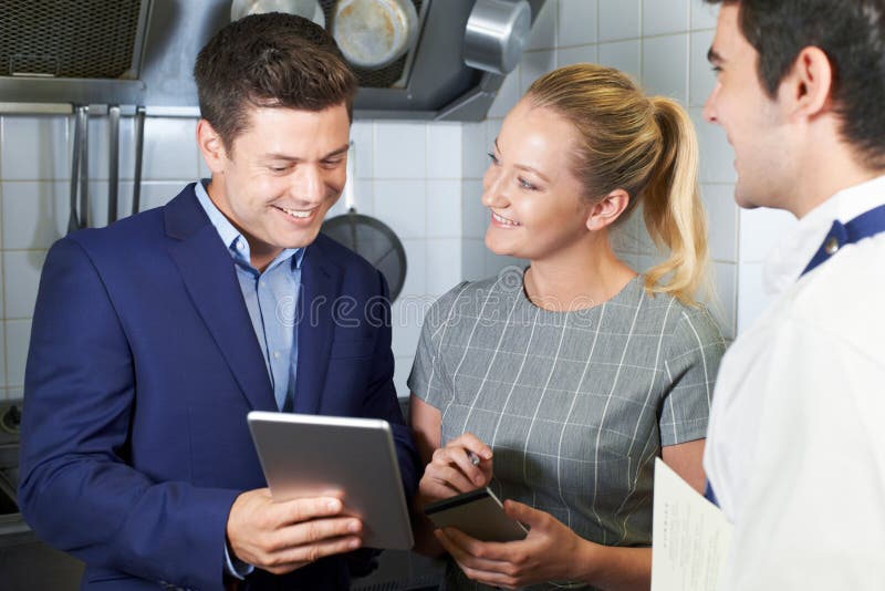 Meeting of Restaurant Team in Kitchen Stock Image - Image of chefs ...