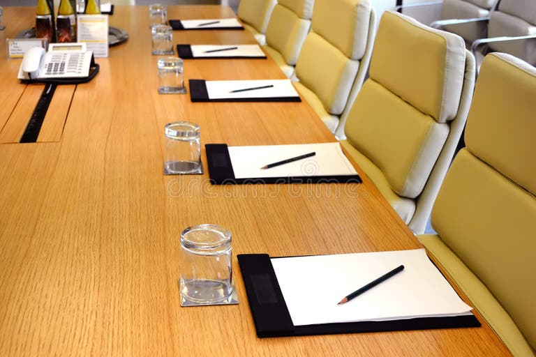 Close - Up of Meeting Table with Stationery and Glasses Stock Photo ...