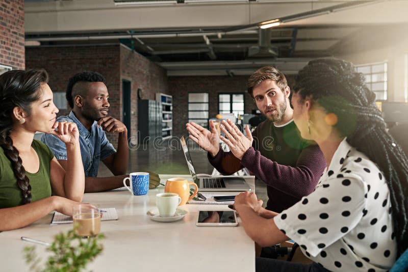 Meeting To Make a Difference in Their Business. a Team of Colleagues ...