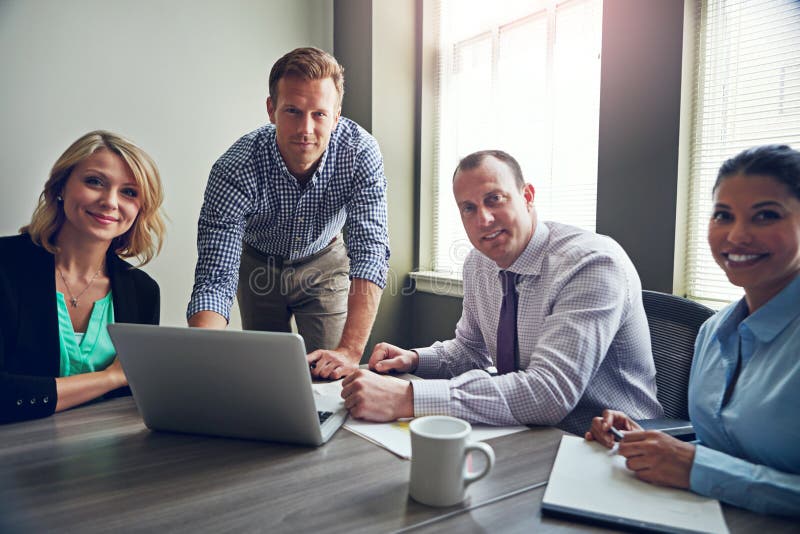 Meetings Keep Us in Sync. Portrait of a Group of Colleagues Having a ...