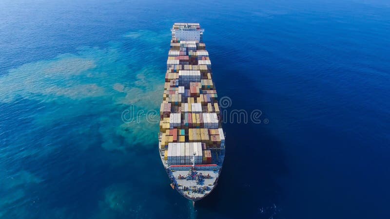 Mega container ship at sea stock photo. Image of industrial - 84540564
