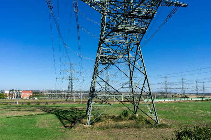 Mega Electric Power Lines in the Field Stock Image - Image of ...