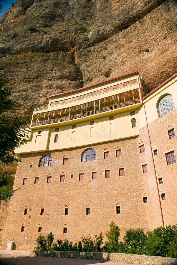 Mega Spileo. stock photo. Image of building, europe, mountain - 65598818