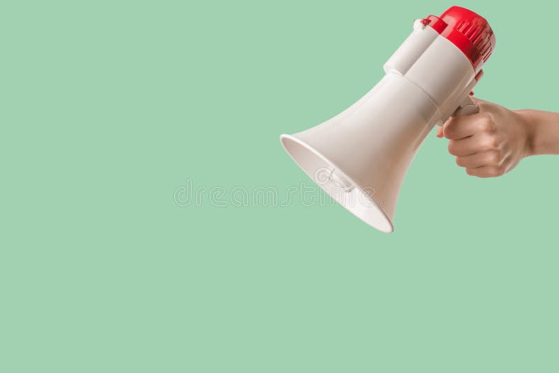 Megaphone in Woman Hands on a Green Background Stock Image - Image of ...