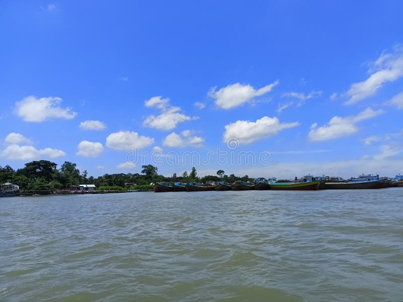 A Peaceful Scene of Boats Gently Bobbing on the Serene Waters of the ...