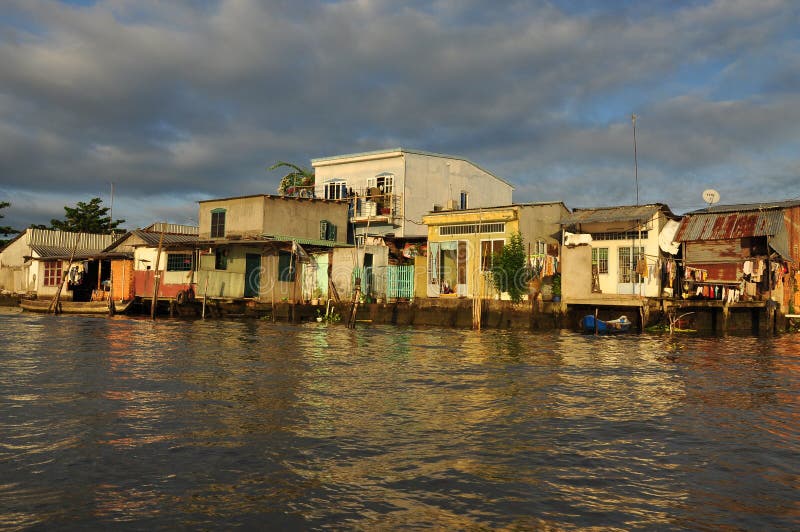 Mekong River Delta. Riverfront Houses and Shacks Stock Image - Image of ...