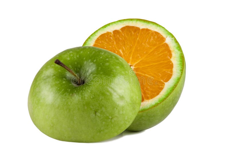 Mela Verde Con L'arancio All'interno Fotografia Stock - Immagine di ...