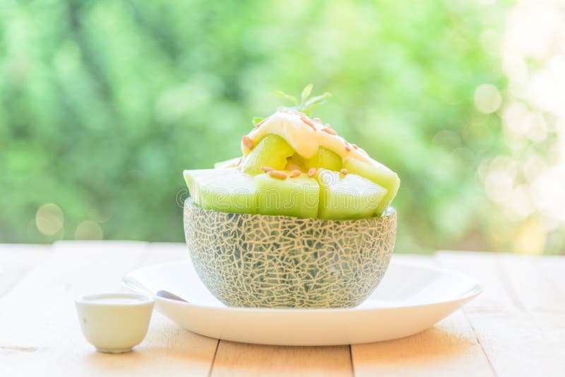 Melon Bingsu with Sweetened Condensed Milk Stock Image - Image of ...