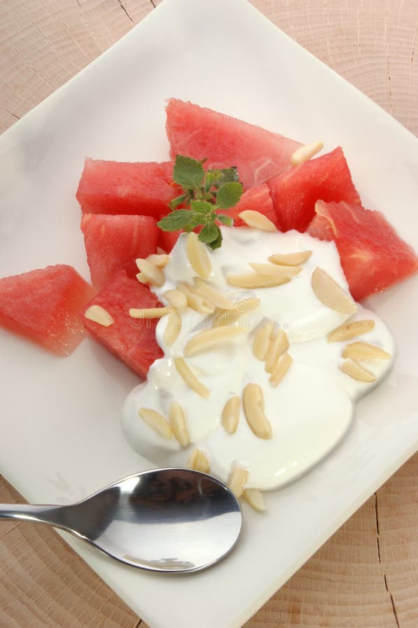 Melon with Cream Fresh and Almond Slivers Stock Photo - Image of melon ...