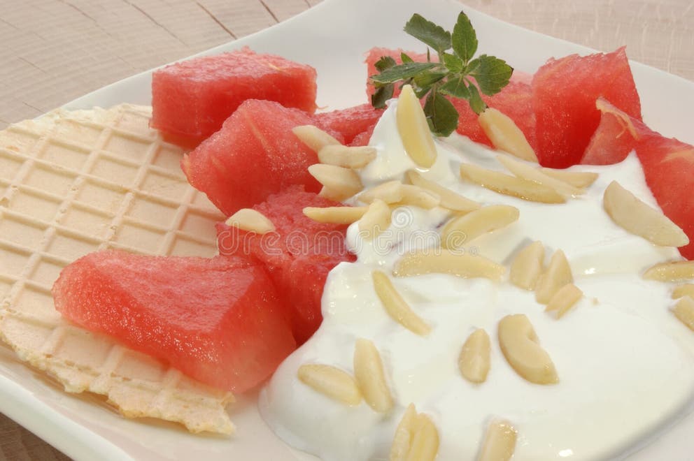 Melon with Cream Fresh and Almond Slivers Stock Image - Image of ...