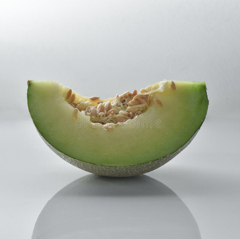 Melon Cut in Half on a White Background Stock Image - Image of ...