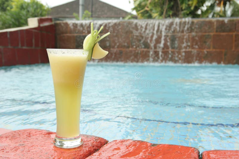 Melon fruit juice at pool stock image. Image of beverage - 7851703