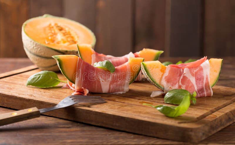 Melon with ham stock photo. Image of appetizer, fresh - 100566538
