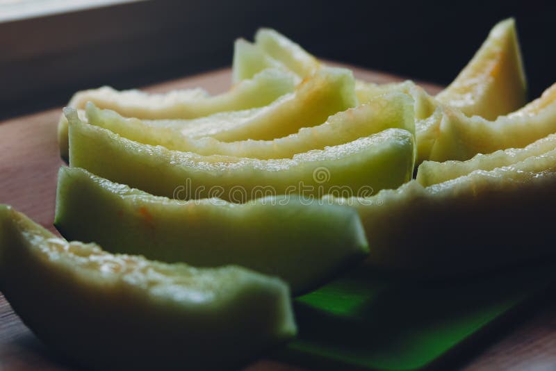 Melon Slices on the Kitchen Table by the Window Stock Photo - Image of ...