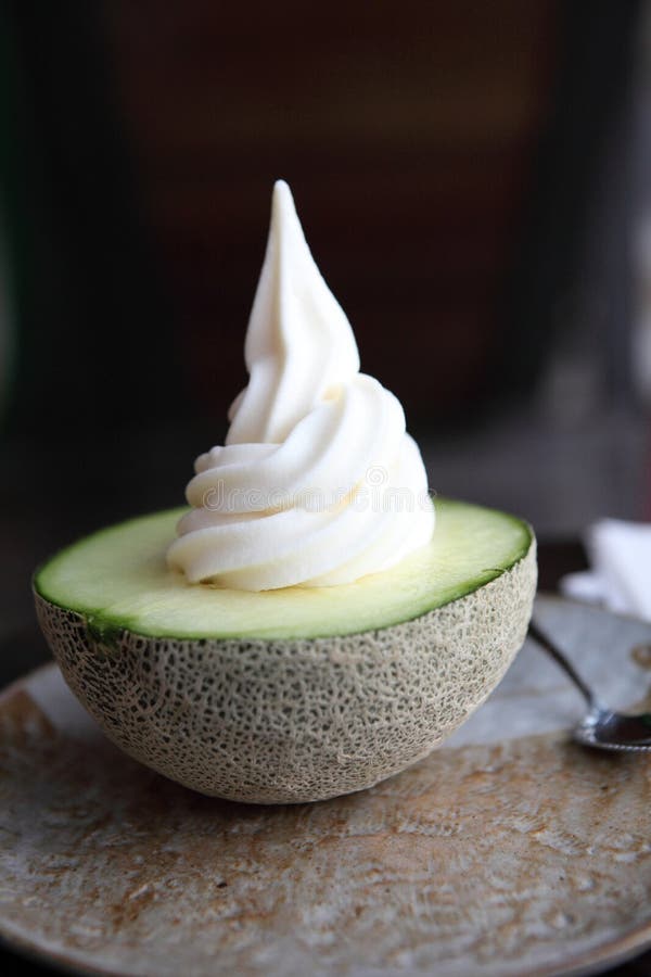 Melon soft cream, Dessert stock image. Image of scoop - 141578921
