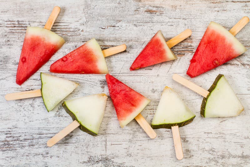 Melon and Watermelon Cut into Triangles Stock Photo - Image of triangle ...