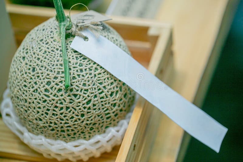 Melon in Wooden Box with Empty White Label and Copy Space for Your Work ...