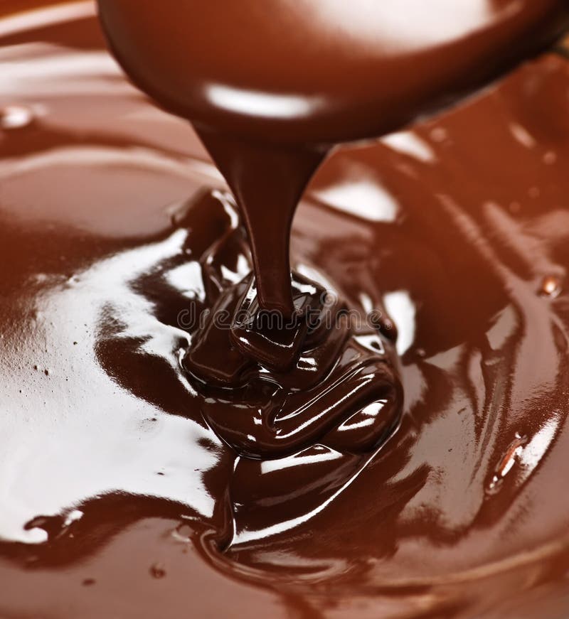 Melted chocolate and spoon stock photo. Image of cooking - 15614812