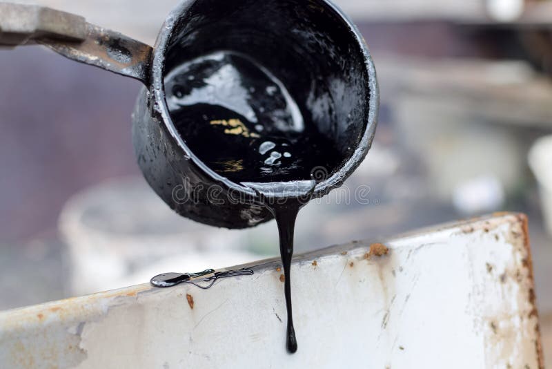Melting Black Tar in Metal Cup on Bonfire Steam Stock Image - Image of ...