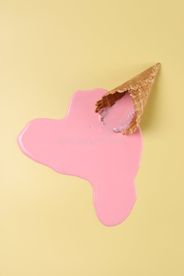 Melted Ice Cream And Wafer Cone On Light Blue Background Space For