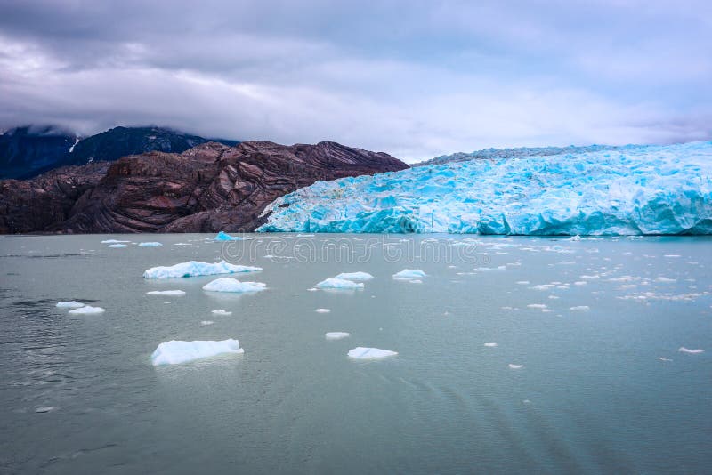 Melting Clear and Blue Ice on the Glacier Gray Stock Image - Image of ...