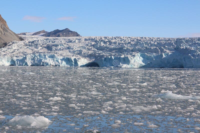 Melting Glacier with Mountains in the Background - Concept of Global ...
