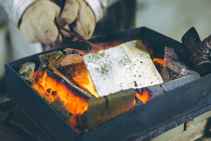 Melting gold at a mill stock image. Image of heavy, factory - 95550047
