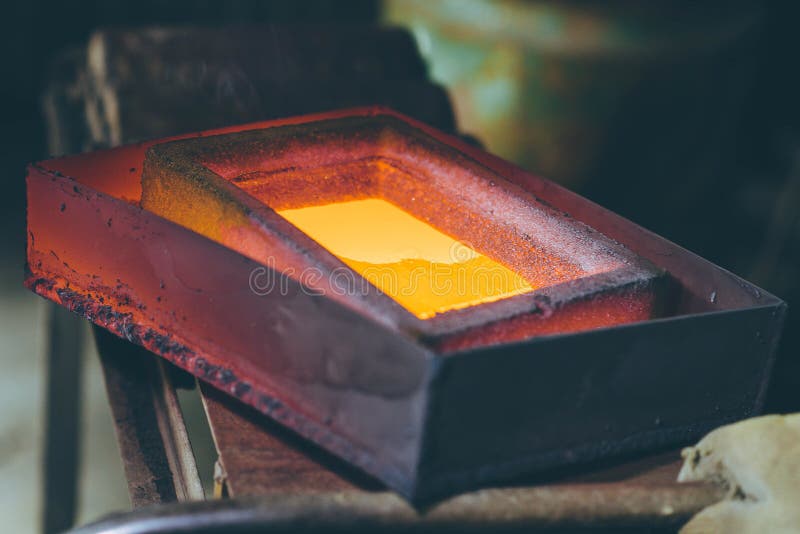 Melting gold at a mill stock image. Image of metallurgy - 95550405