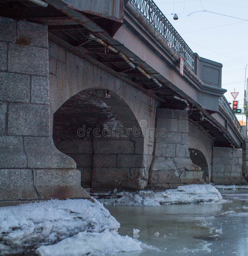 Melting Ice at the Base of the Bridge in Early Spring Stock Image ...