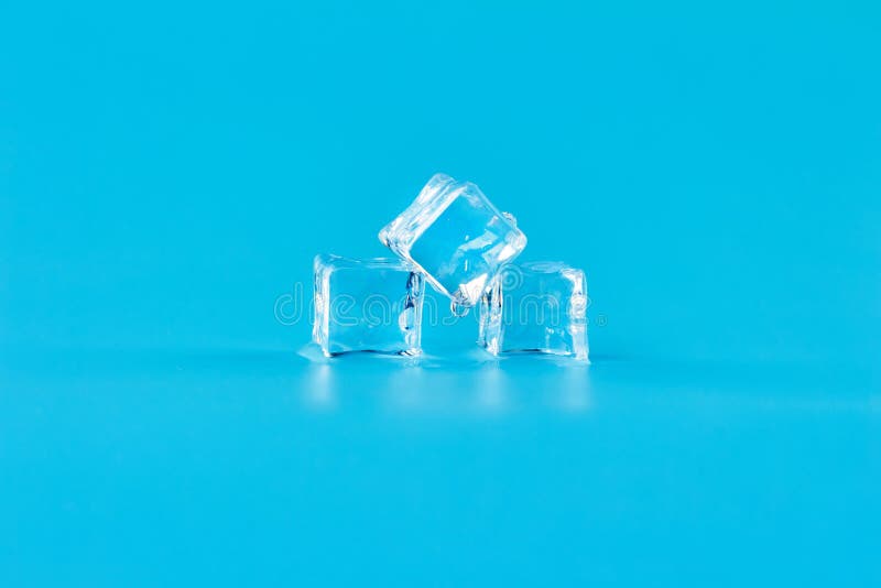 Melting Ice on a Blue Background. a Dripping Drop from the Central Ice ...