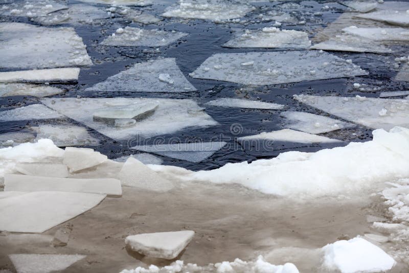 Melting Ice. Broken Ice Floes Drift on the Surface of the Water Stock ...