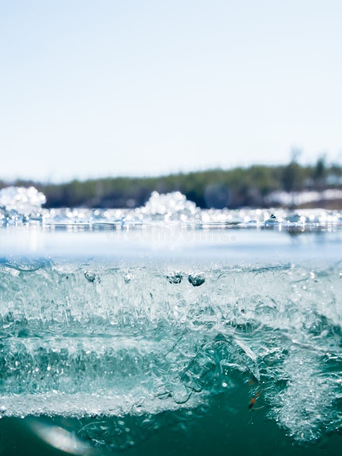 Melting Ice Crystals on Surface of Clear-watered Lake Stock Photo ...