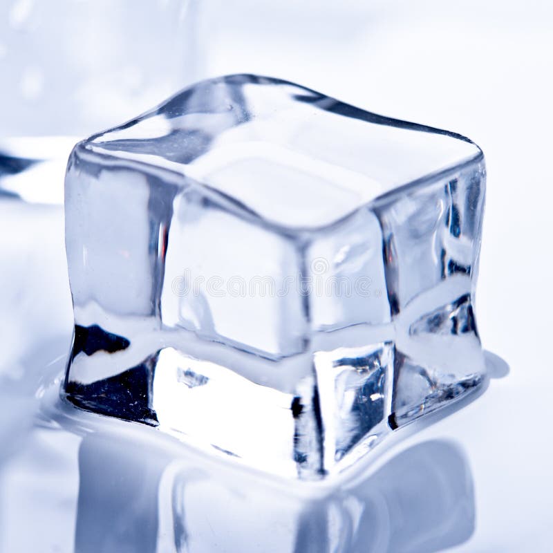 Melting ice cube stock photo. Image of glassy, cool, cube - 27218628