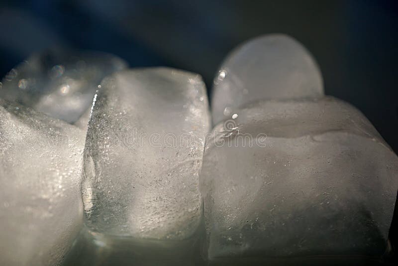 Melting Ice Cubes Close Up stock image. Image of goldenhour - 138957739