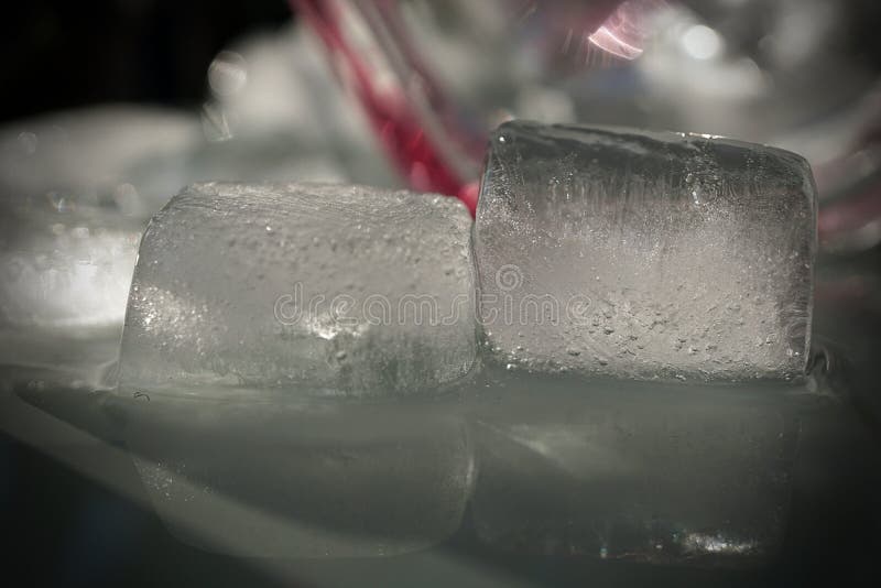 Ice cubes in the sun stock image. Image of snow, mountains - 18208439