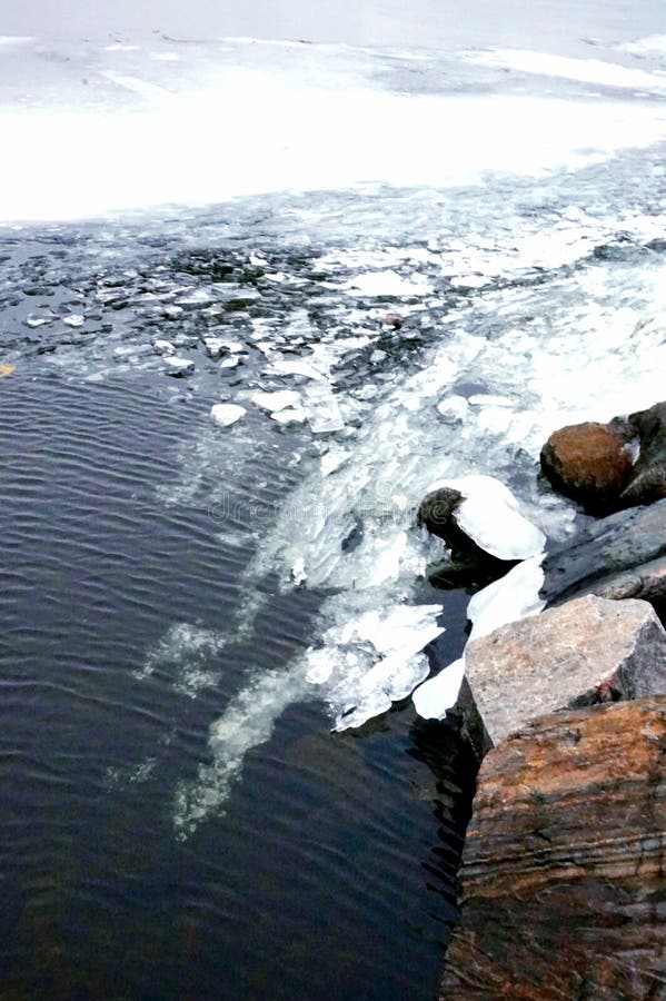 The Melting Ice Near the Shore, Going Under the Water Stock Photo ...