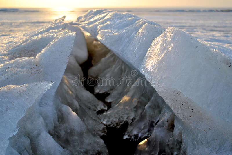 Sun Rays Melting the Snow on Top of a Mountain Stock Photo - Image of ...