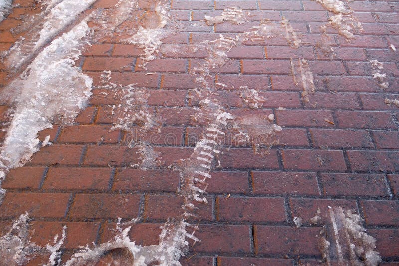Melting Snow on the Sidewalk Stock Image - Image of pavement, footprint ...