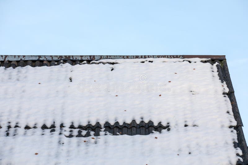 Melting Snow on the Slate Roof of the House, Blue Sky Stock Image ...