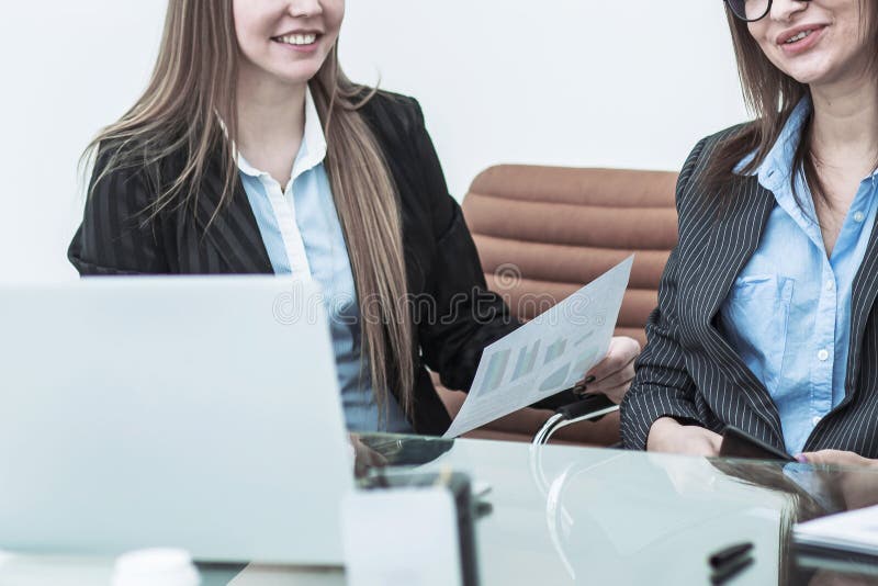 Members of a Business Team Discussing Financial Documents Stock Photo ...