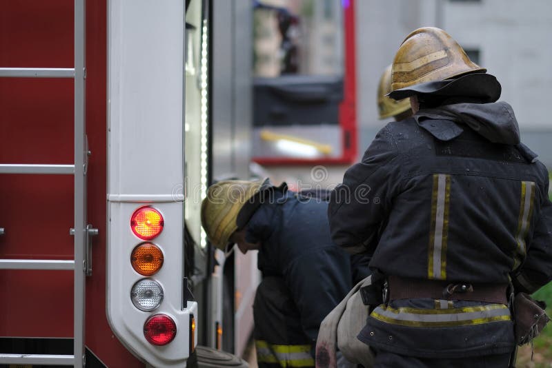 Fire brigade at work editorial image. Image of helmet - 102163370