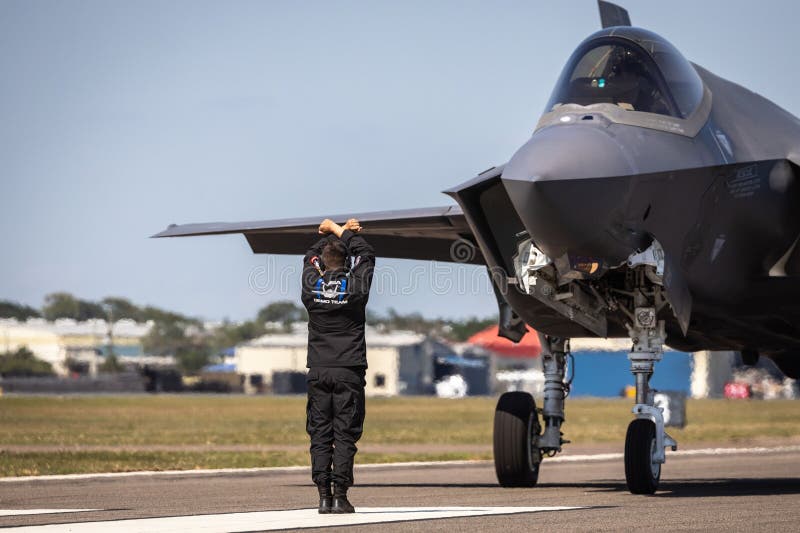 Members of the US Air Force F-35 Demonstration Team Assisting a ...
