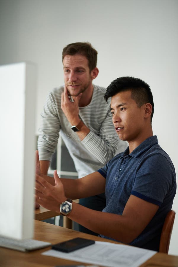 Men, Asian Designer and Discussion at Table with Computer, Development ...