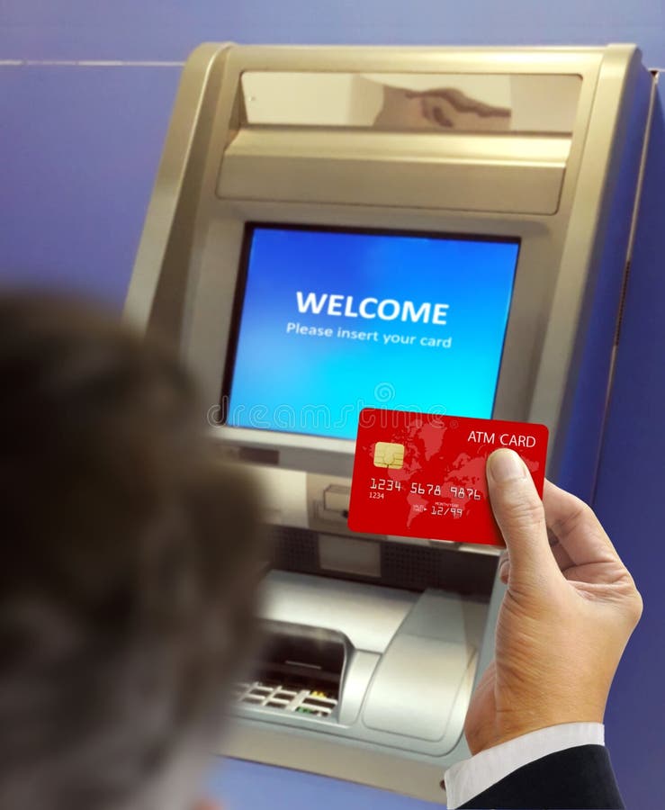 Men at ATM Machine Doing Banking Transaction Stock Image - Image of ...