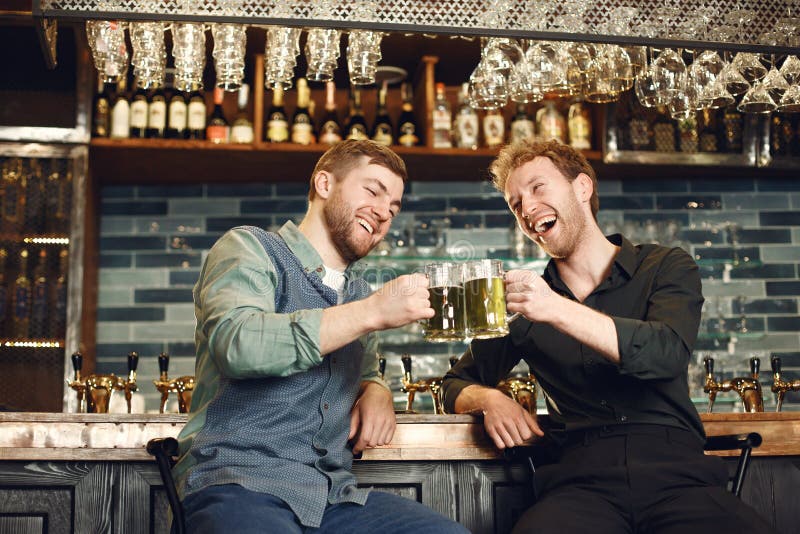 Men at Bar Behind Bar with Beer Stock Image - Image of relaxation ...