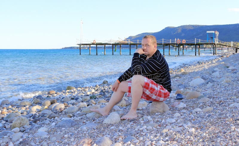 Men on the beach stock photo. Image of caucasian, ocean - 148115398
