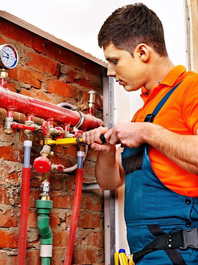 Men Builder Fixing Heating System . Stock Photo - Image of joints ...