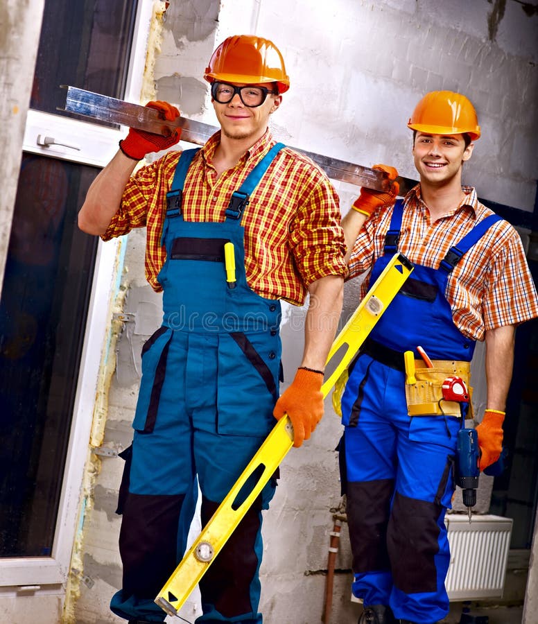 Men in builder uniform. stock image. Image of builder - 37504983