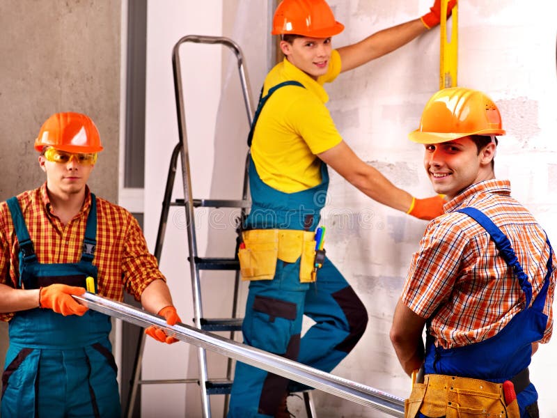 Men in builder uniform. stock image. Image of gypsum - 35354009