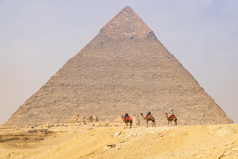 Men on Camels at the Great Pyramid Complex in Giza Editorial ...